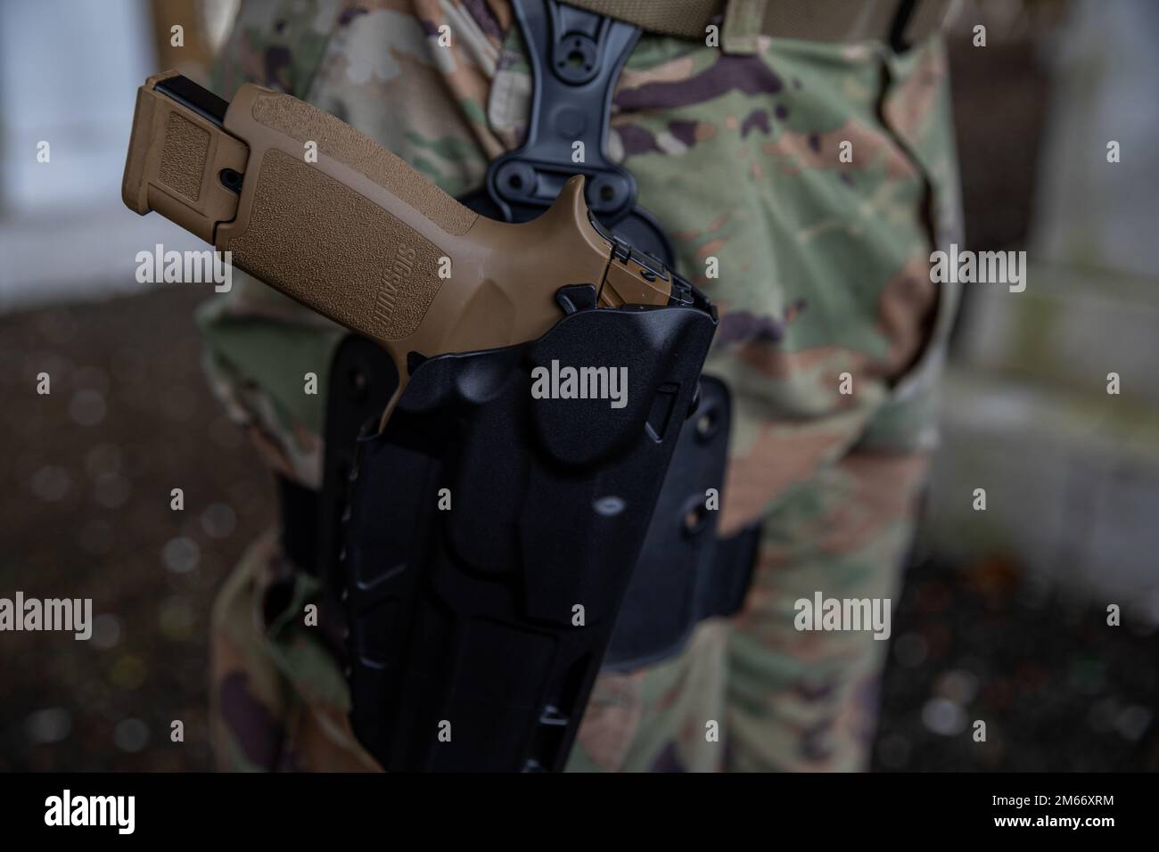 An M17 service pistol is secured in a Connecticut Army National Guard ...