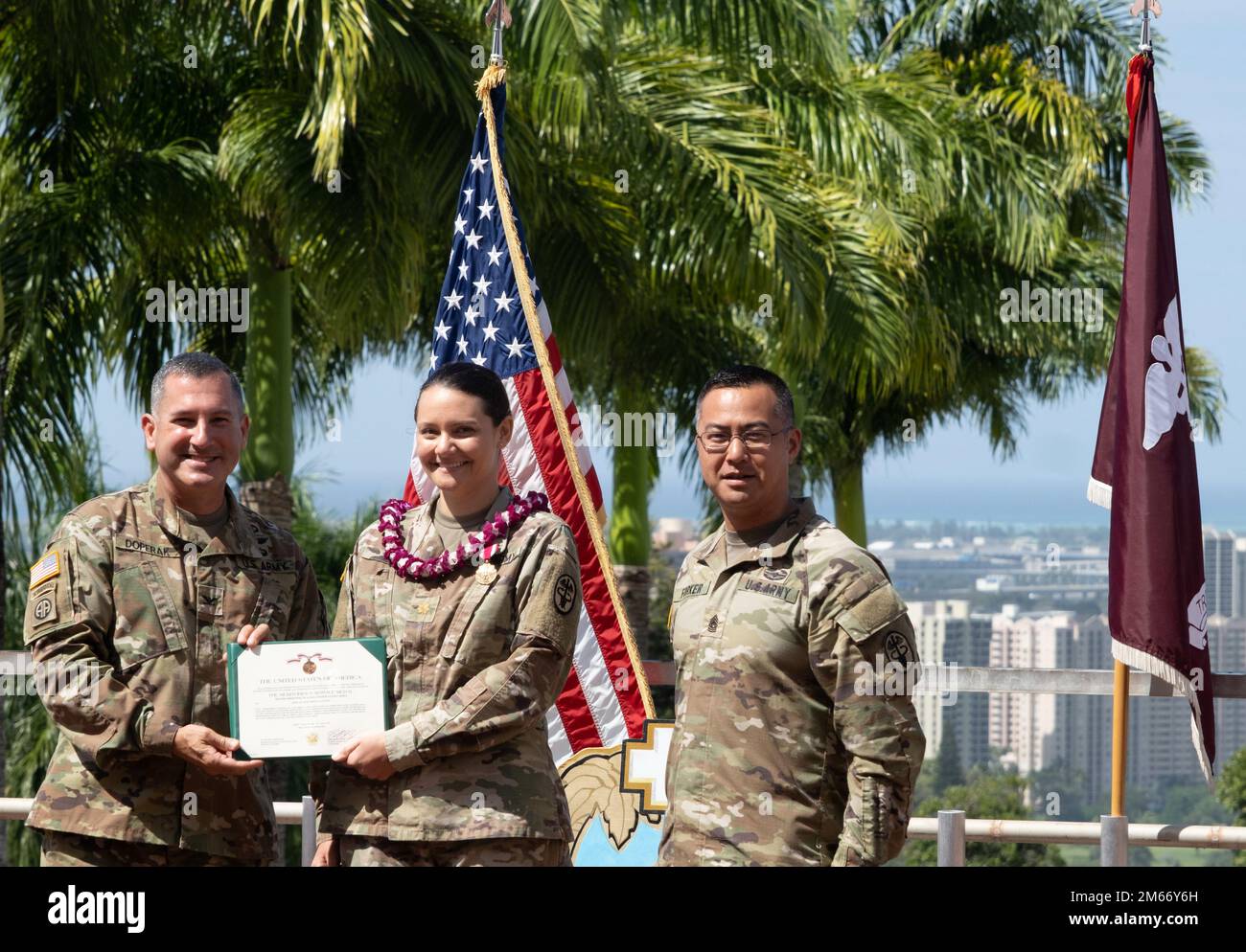 Maj. Christie Lang receives Meritorious Service Medal. (from left) Col ...