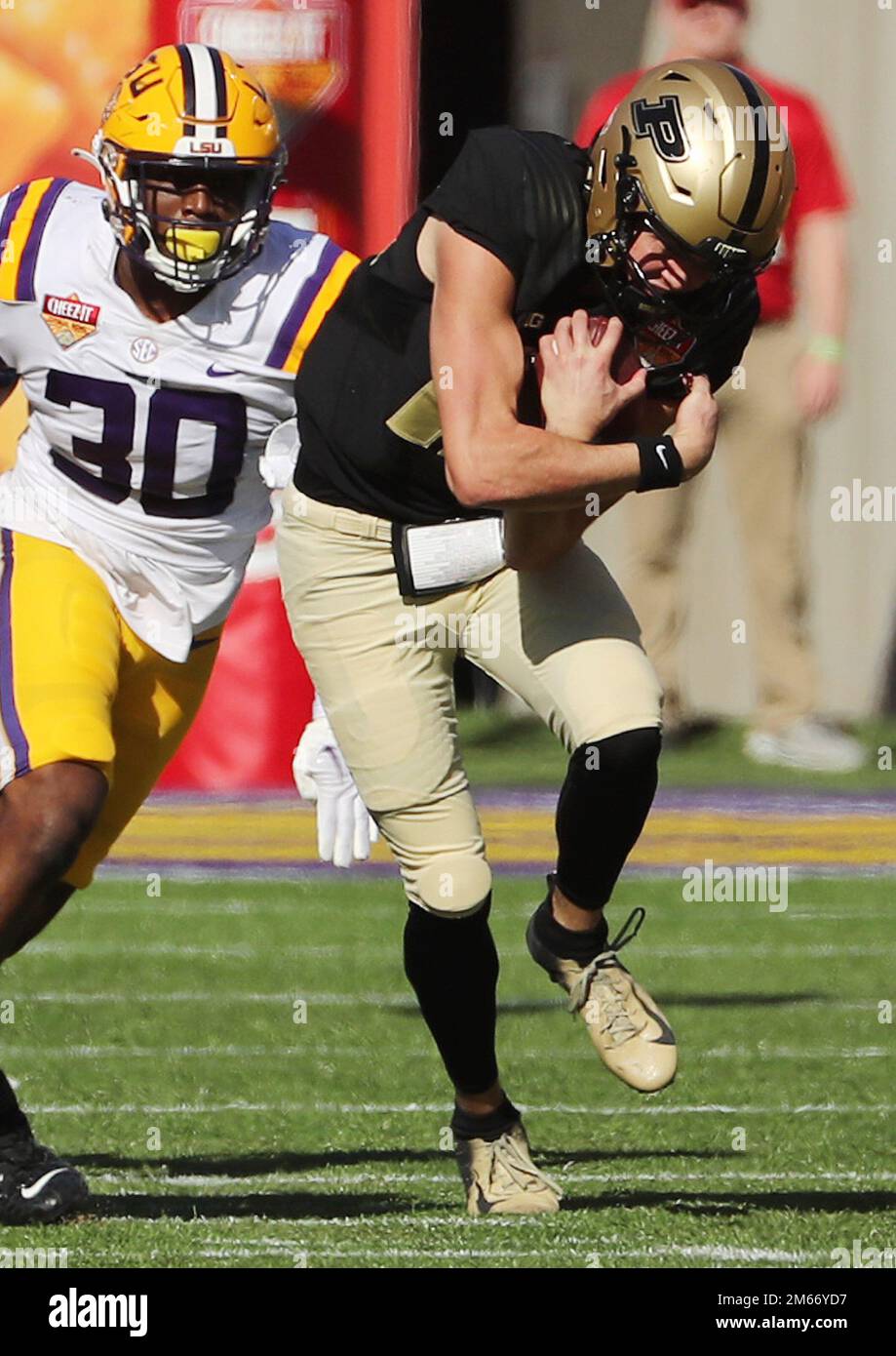 Orlando, USA. 02nd Jan, 2023. Purdue quarterback Austin Burton (with ...