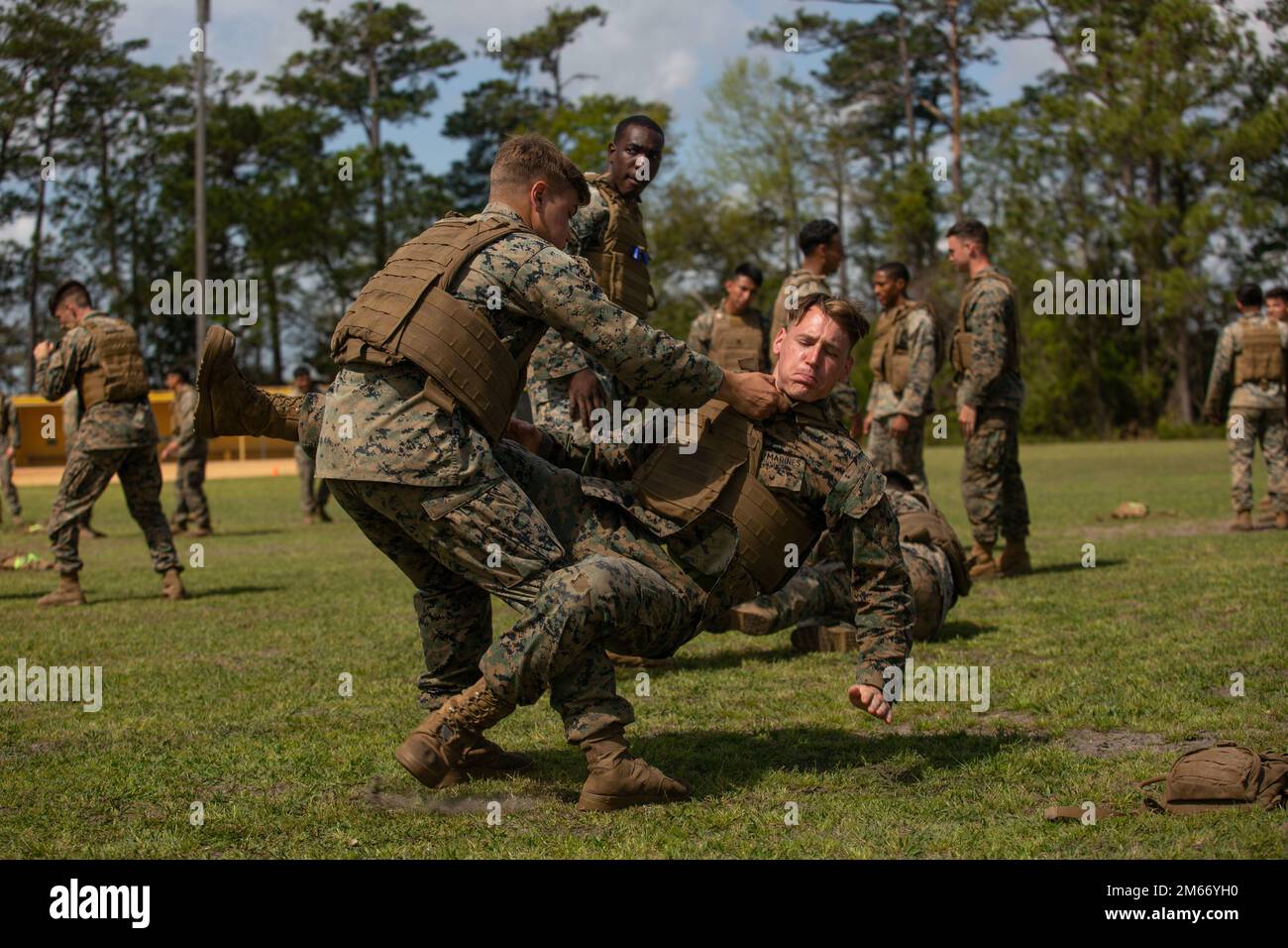 U.S. Marine Corps Cpl. Isaac Bogdan, left, Martial Arts Instructor (MAI ...