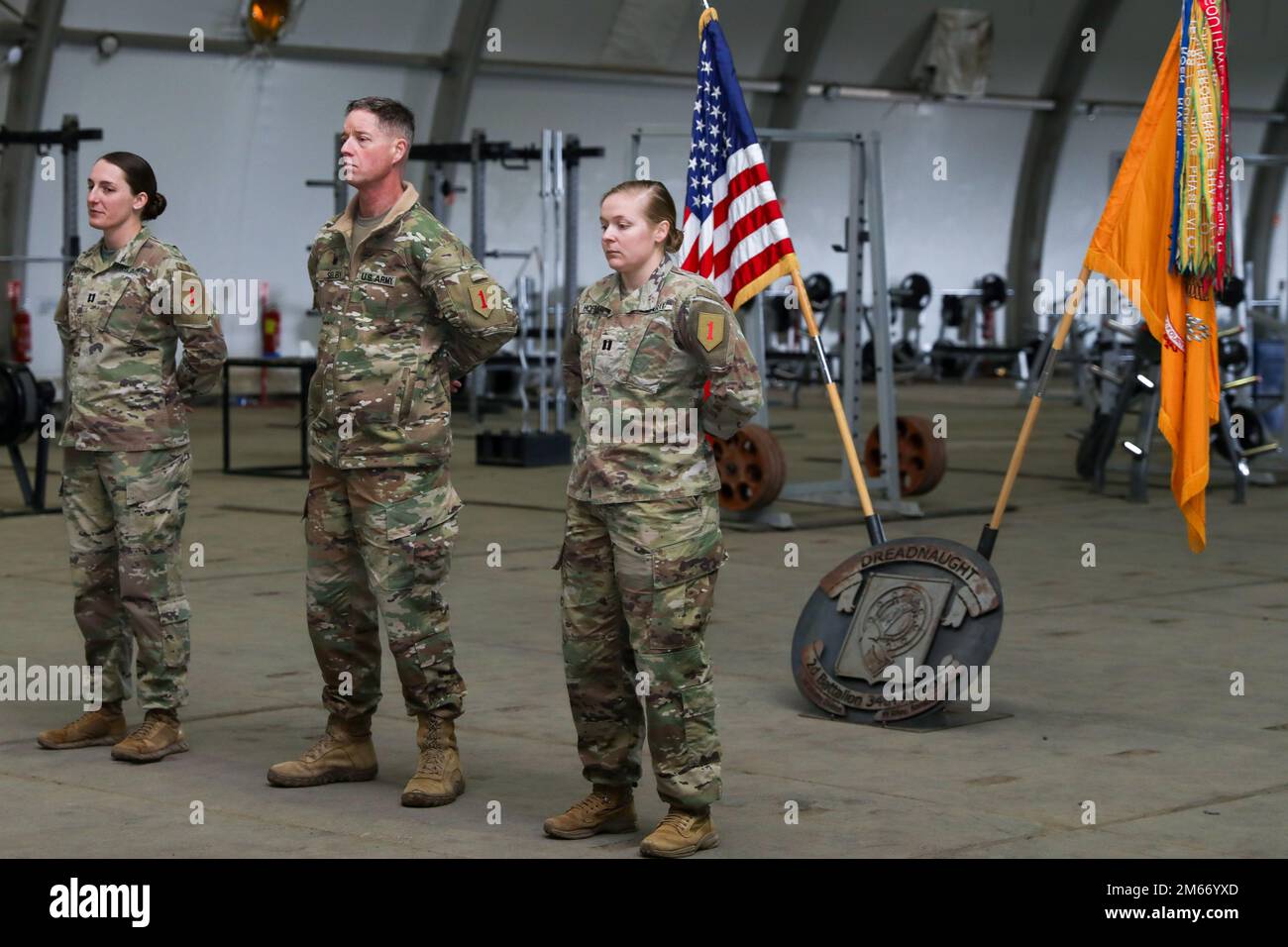 From left, Capt. Ann Moyer, outgoing commander of Field Support Command ...