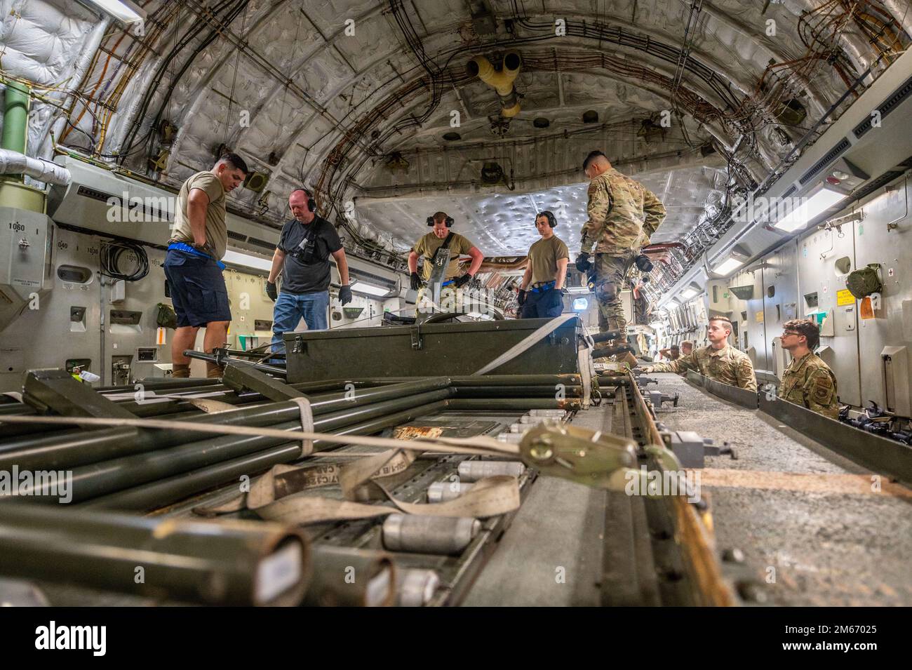 U.S. Airmen assigned to the 60th Aerial Port Squadron and 4th Airlift ...