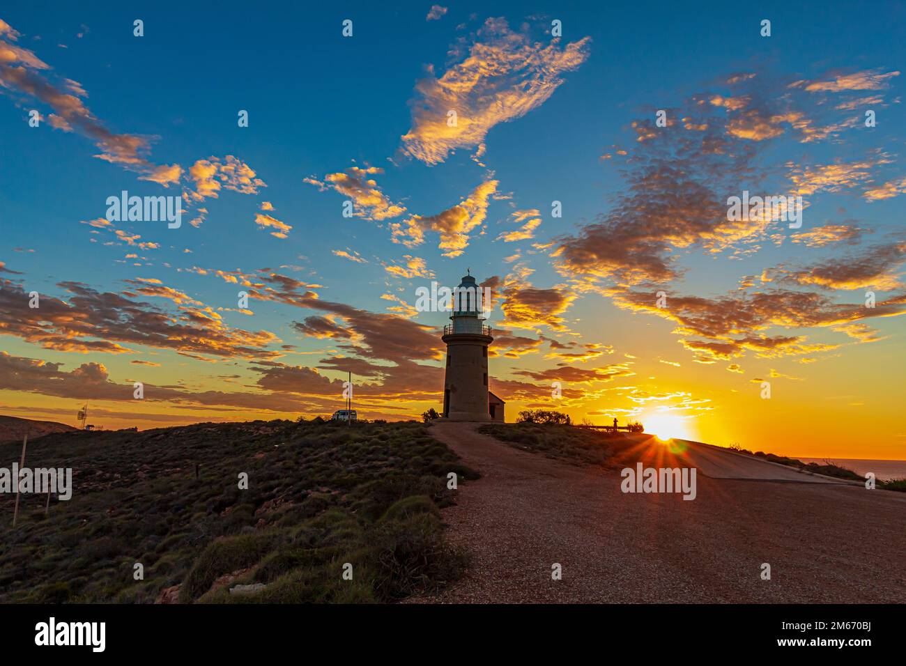 Vlamingh Head Lighthouse during sunset at Cape Range National Park in ...