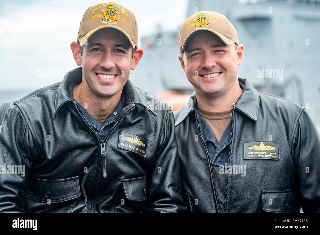 PHILIPPINE SEA (April 8, 2022) Cmdr. Douglas Robb, commanding officer ...