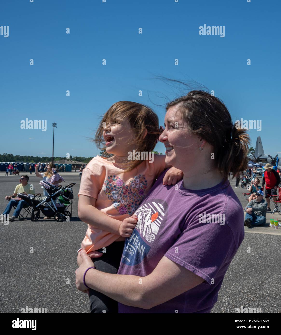 The Hageman Family marvel at the Pitts S2S Raptor aircraft during the ...