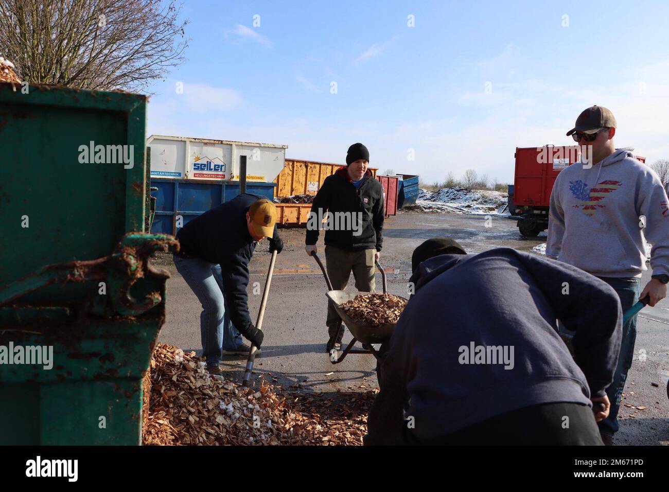 1st Air Cavalry Troopers work with Hundehaus volunteers to move and ...
