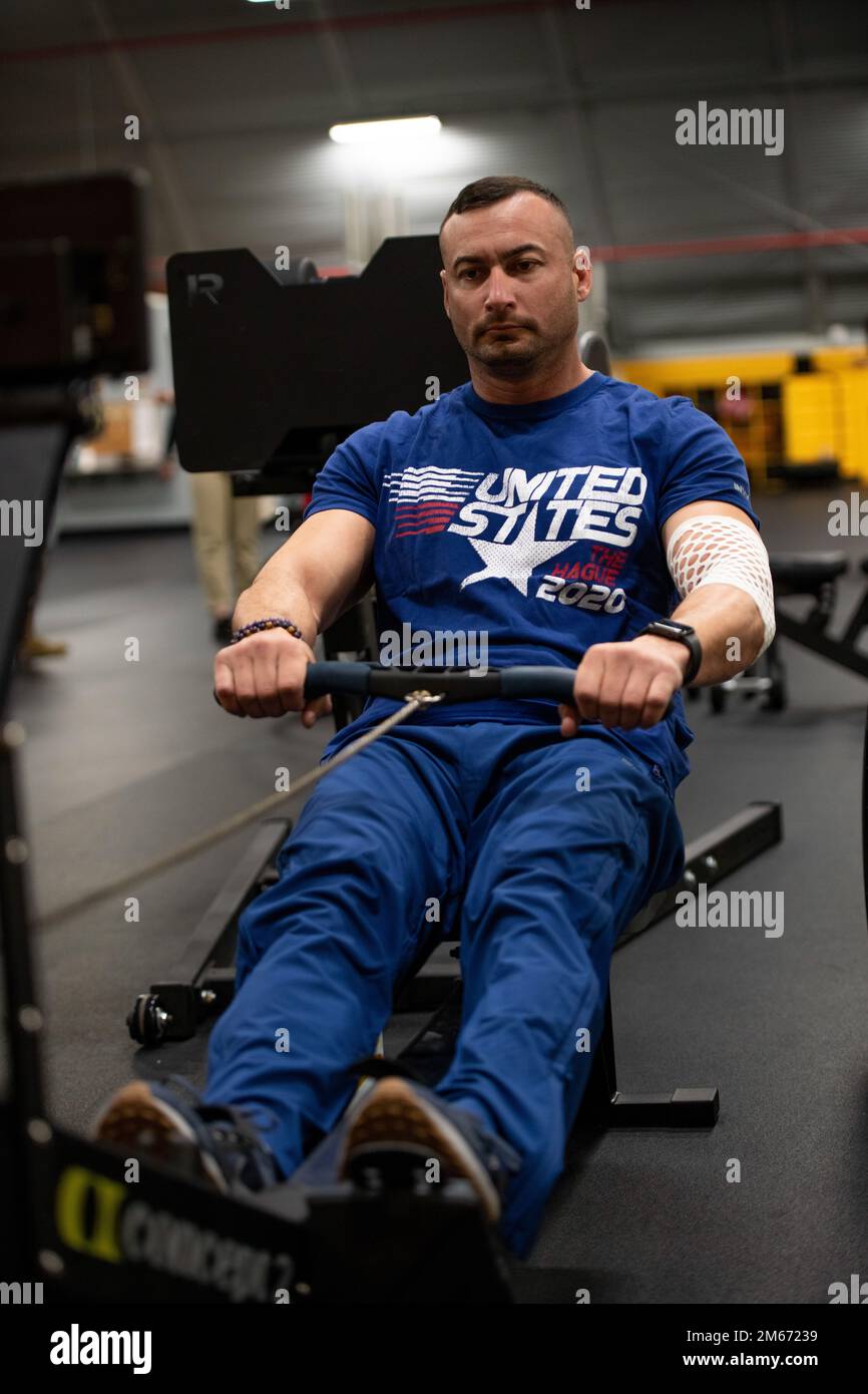 U.S. Marine Corps Staff Sgt. Robert Dominguez, Team U.S., rows during ...
