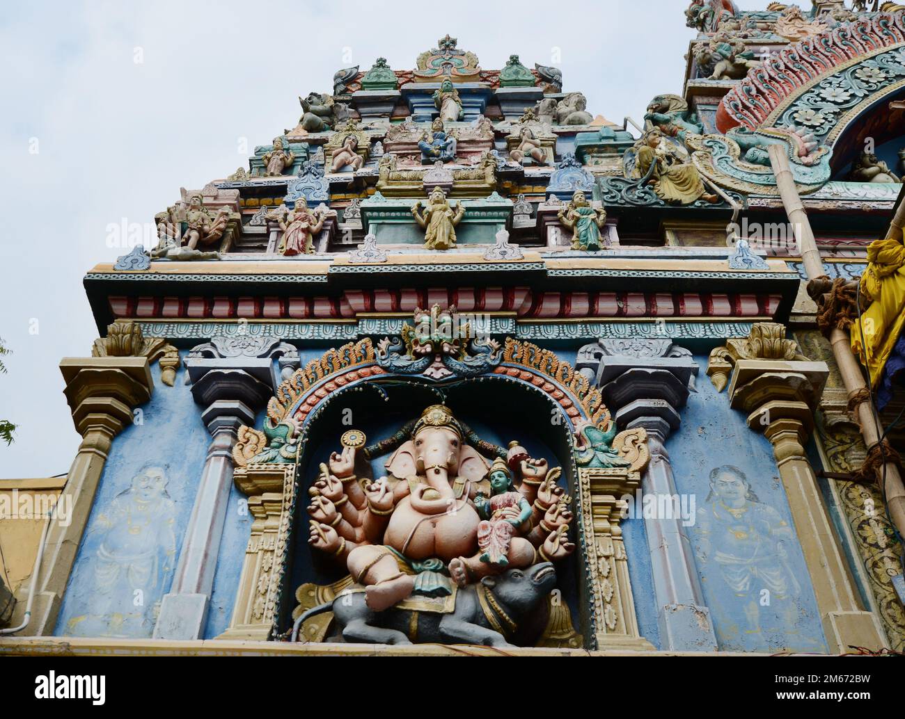 The colorful gopurams of the Meenakshi Amman Temple in Madurai, Tamil ...