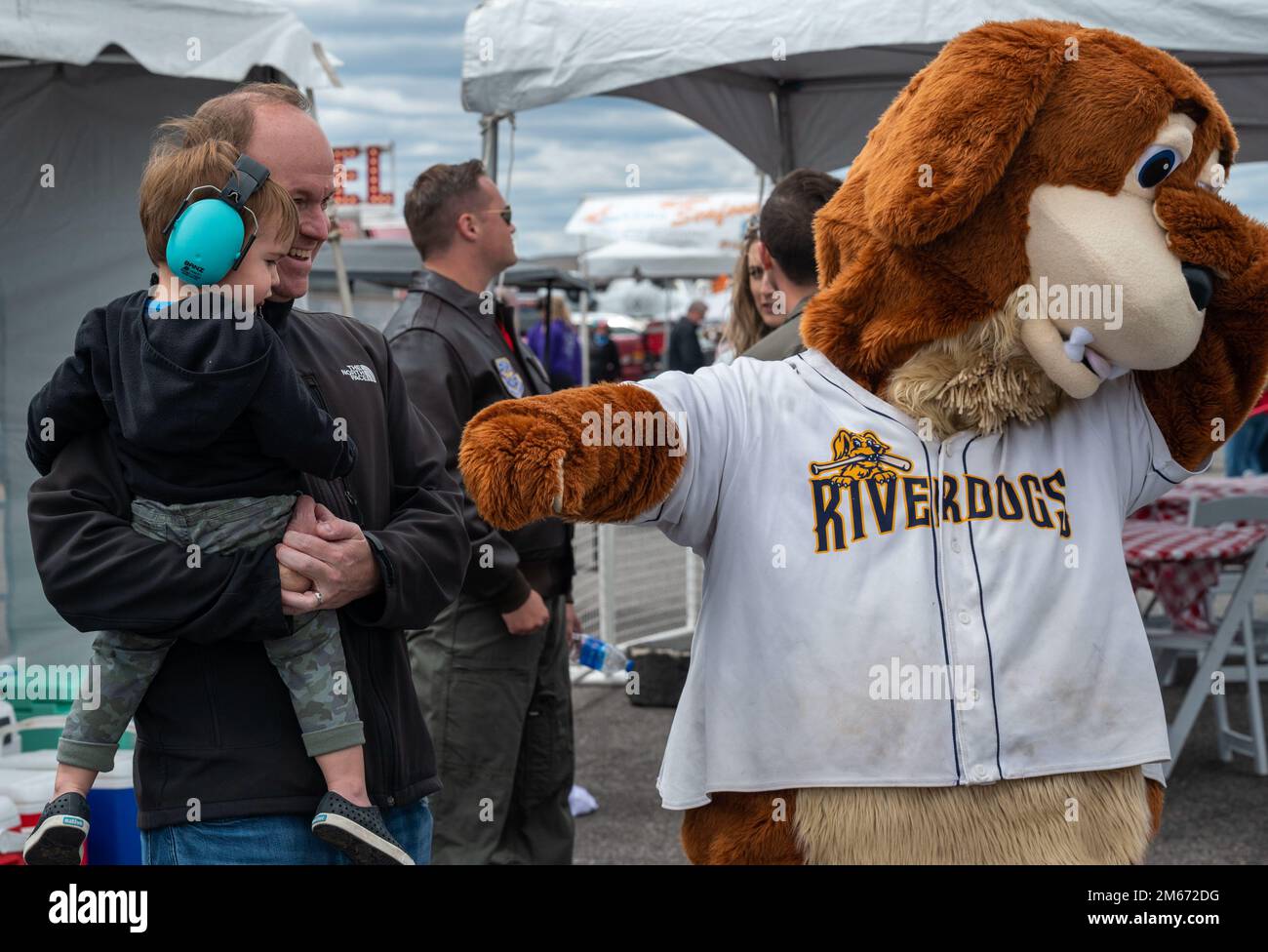 The Riverdogs mascot, Charlie T. RiverDog, interacts with spectators at ...