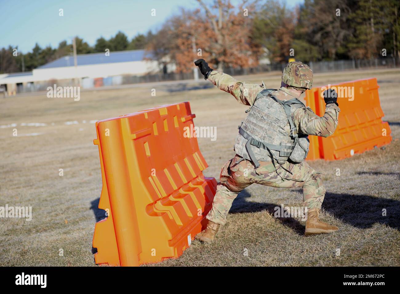 A Soldier prepares to throw a practice grenade during the Best Warrior ...