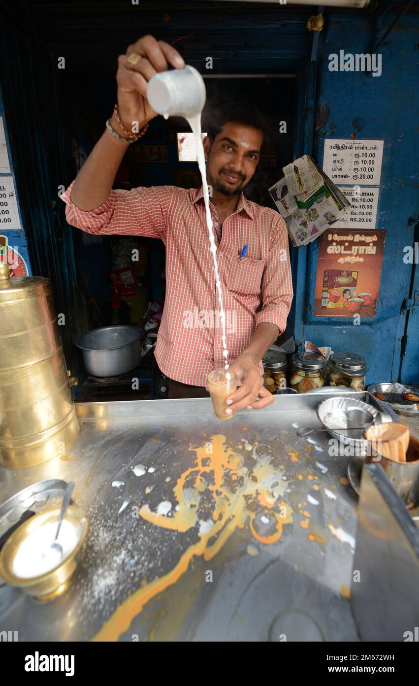 A Chai Wallah preparing traditional Indian Chai ( milk tea ) in Madurai ...