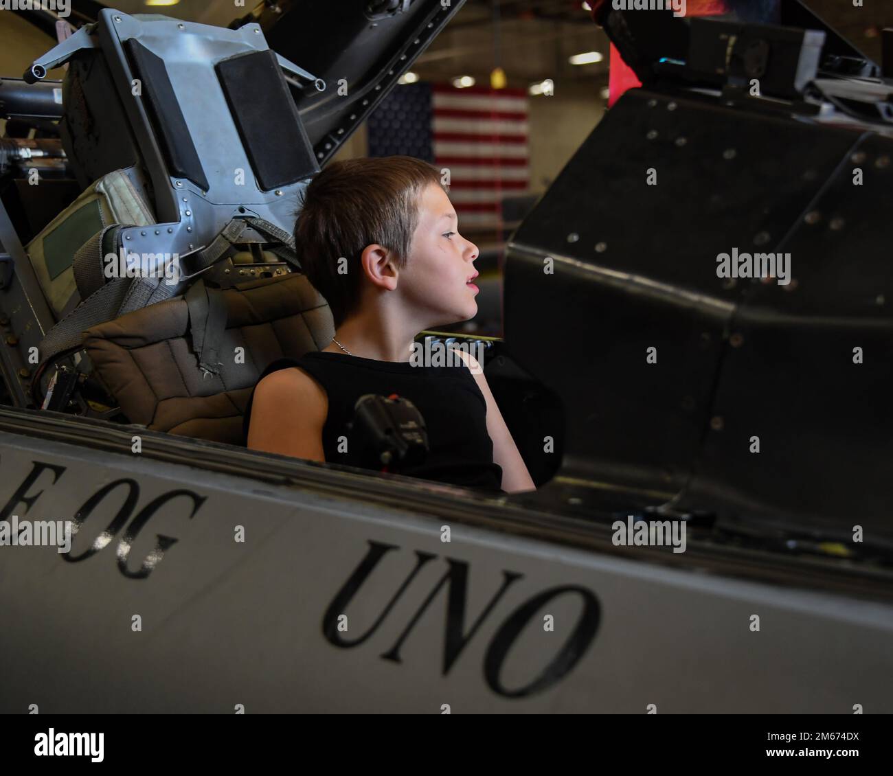 Caiden Caperton, 9, takes a look around an F-16 Falcon during Operation ...