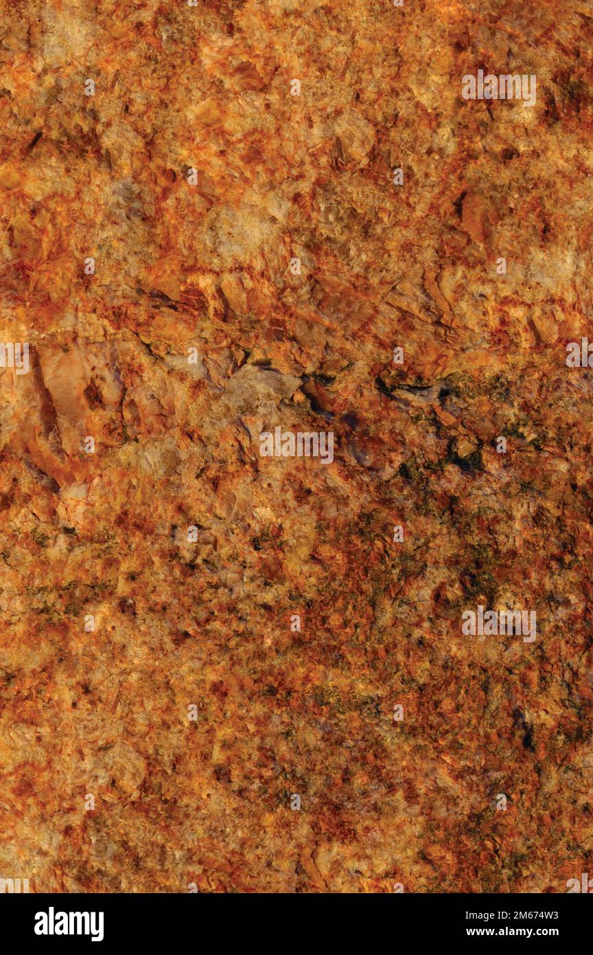 Raw pegmatite feldspar igneous rock terracotta pattern, rusty orange ...