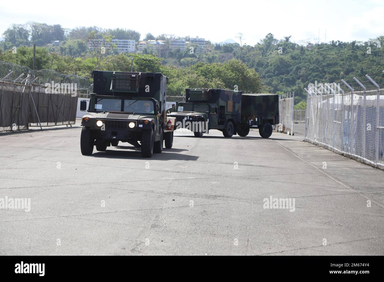 As part of the Army Prepositioned Stock 3, military vehicles are staged ...