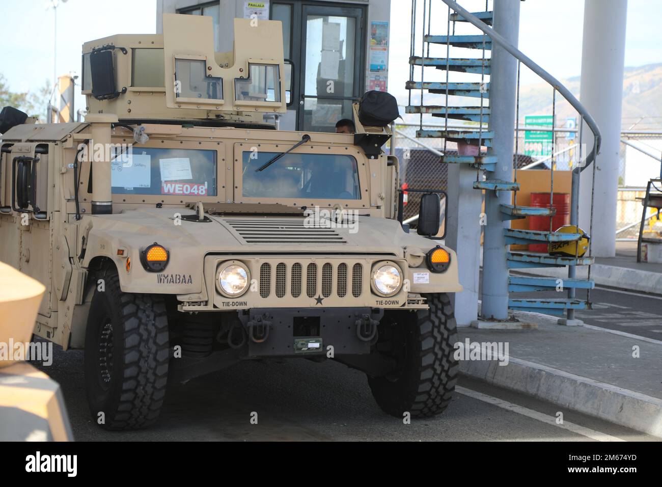 As part of the Army Prepositioned Stock 3, military vehicles are staged ...