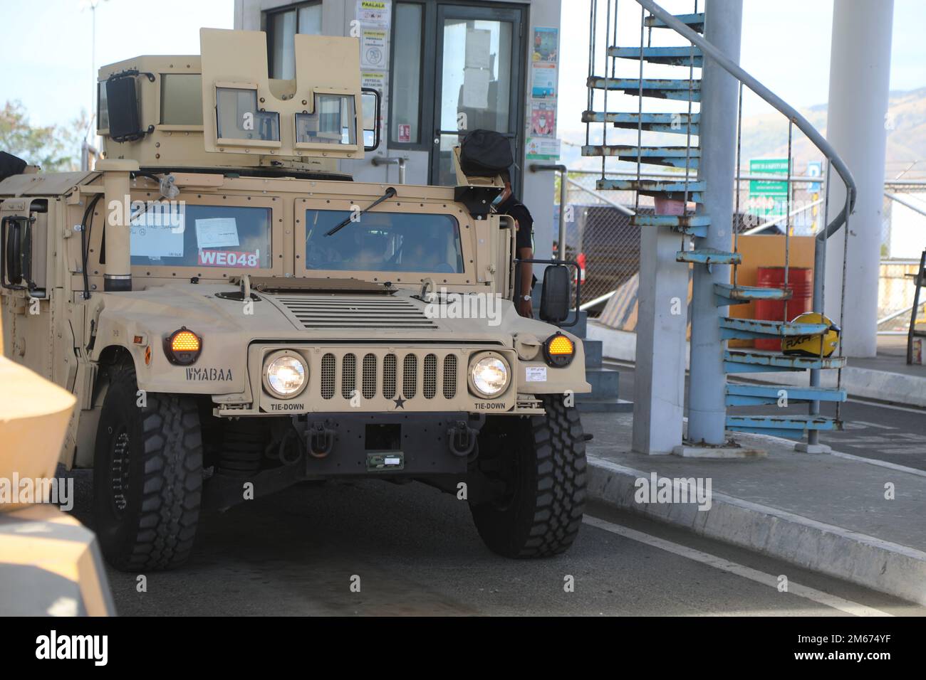 As part of the Army Prepositioned Stock 3, military vehicles are staged ...