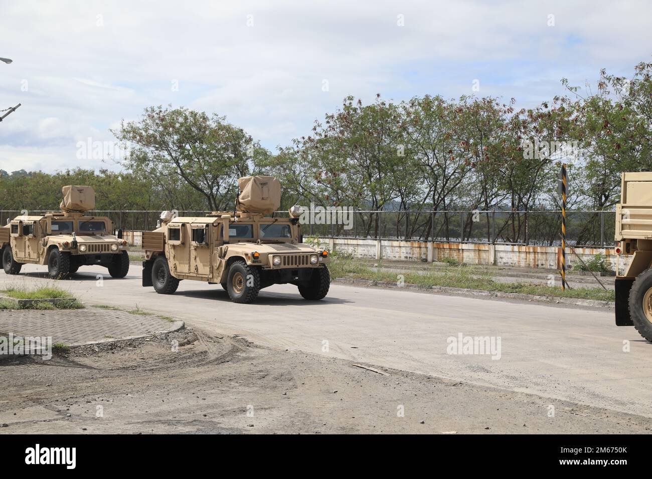 As part of the Army Prepositioned Stock 3, military vehicles are staged ...