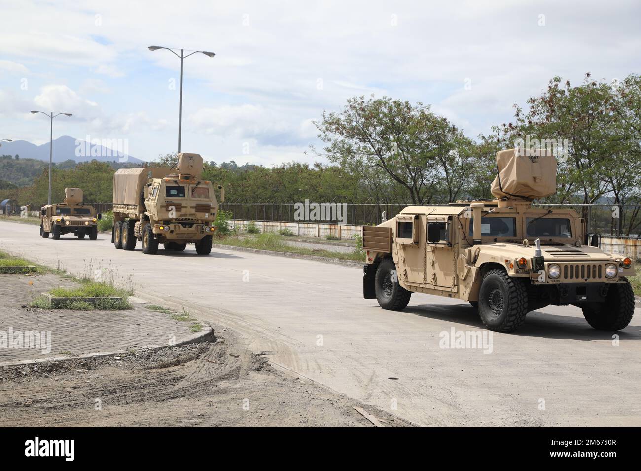 As part of the Army Prepositioned Stock 3, military vehicles are staged ...