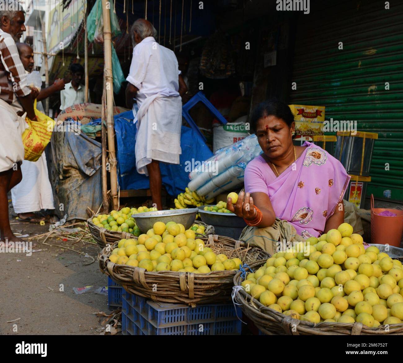 A lime vendor at the market in Maduria, Tamil Nadu, India Stock Photo ...