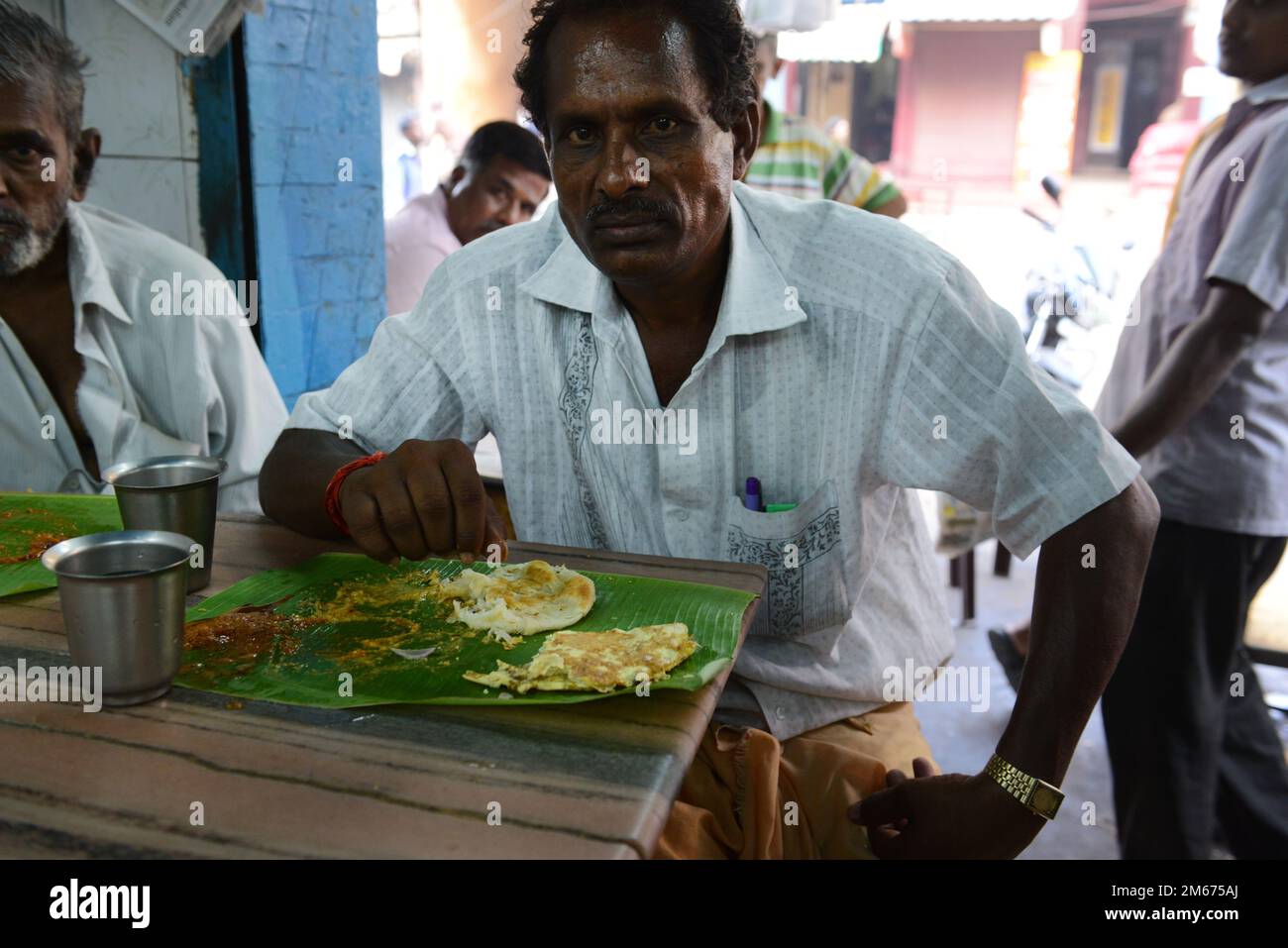 Roti / Paratha with dhal served on Banana leaf in a small restaurant in ...