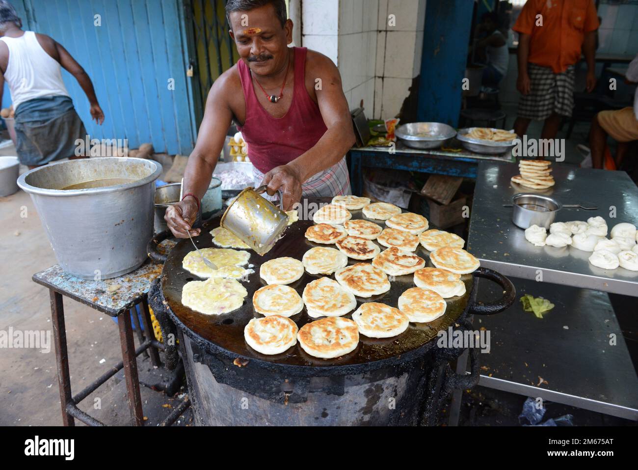 Roti / Paratha bread prepared in a small restaurant in Madurai, Tamil ...