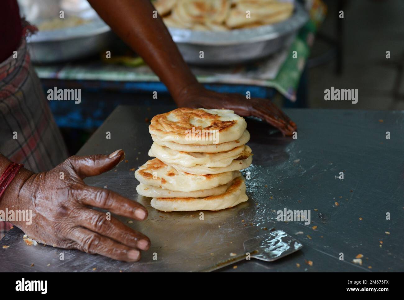 Roti / Paratha bread prepared in a small restaurant in Madurai, Tamil ...
