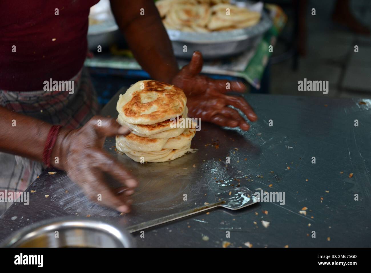 Roti / Paratha bread prepared in a small restaurant in Madurai, Tamil ...