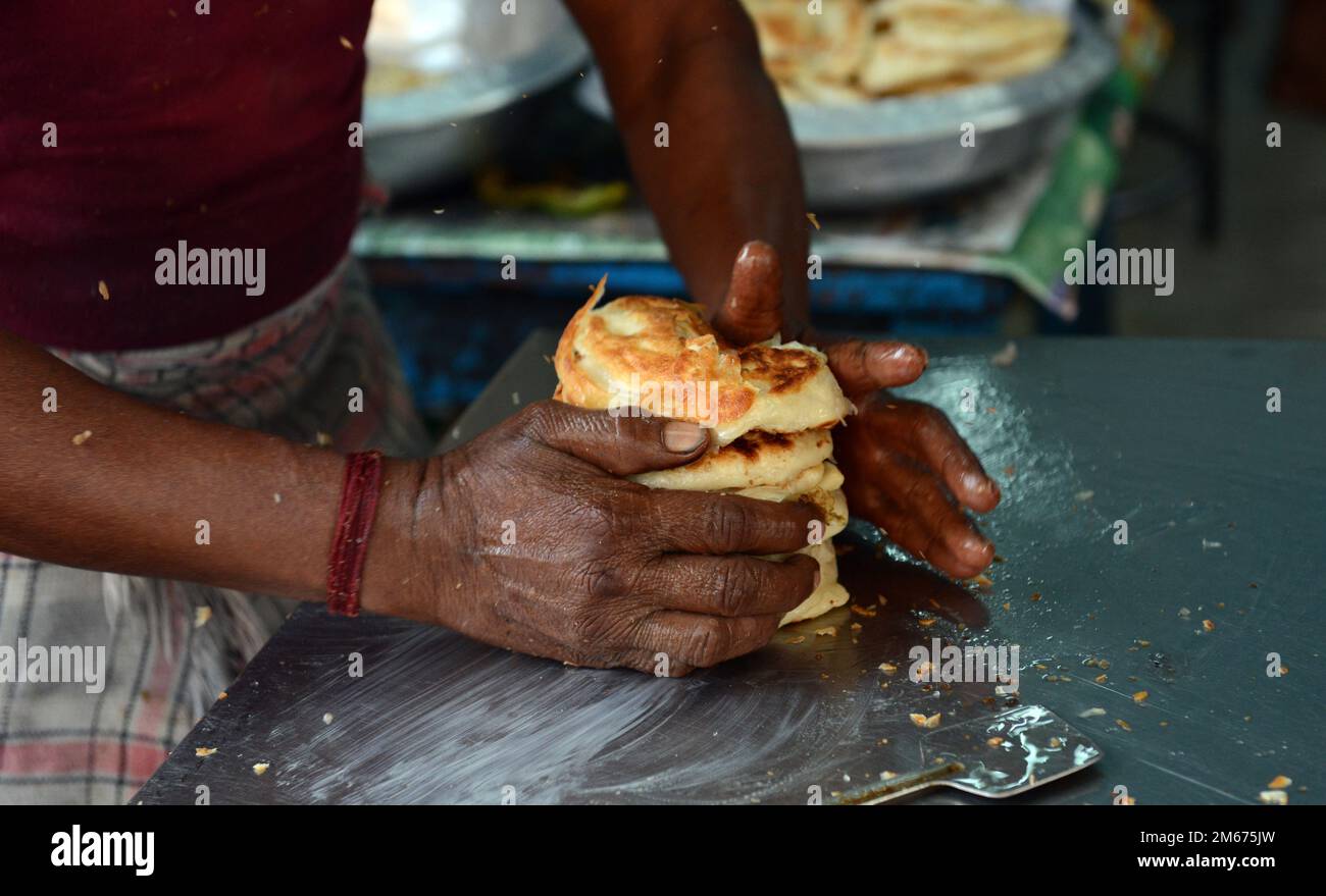 Roti / Paratha bread prepared in a small restaurant in Madurai, Tamil ...
