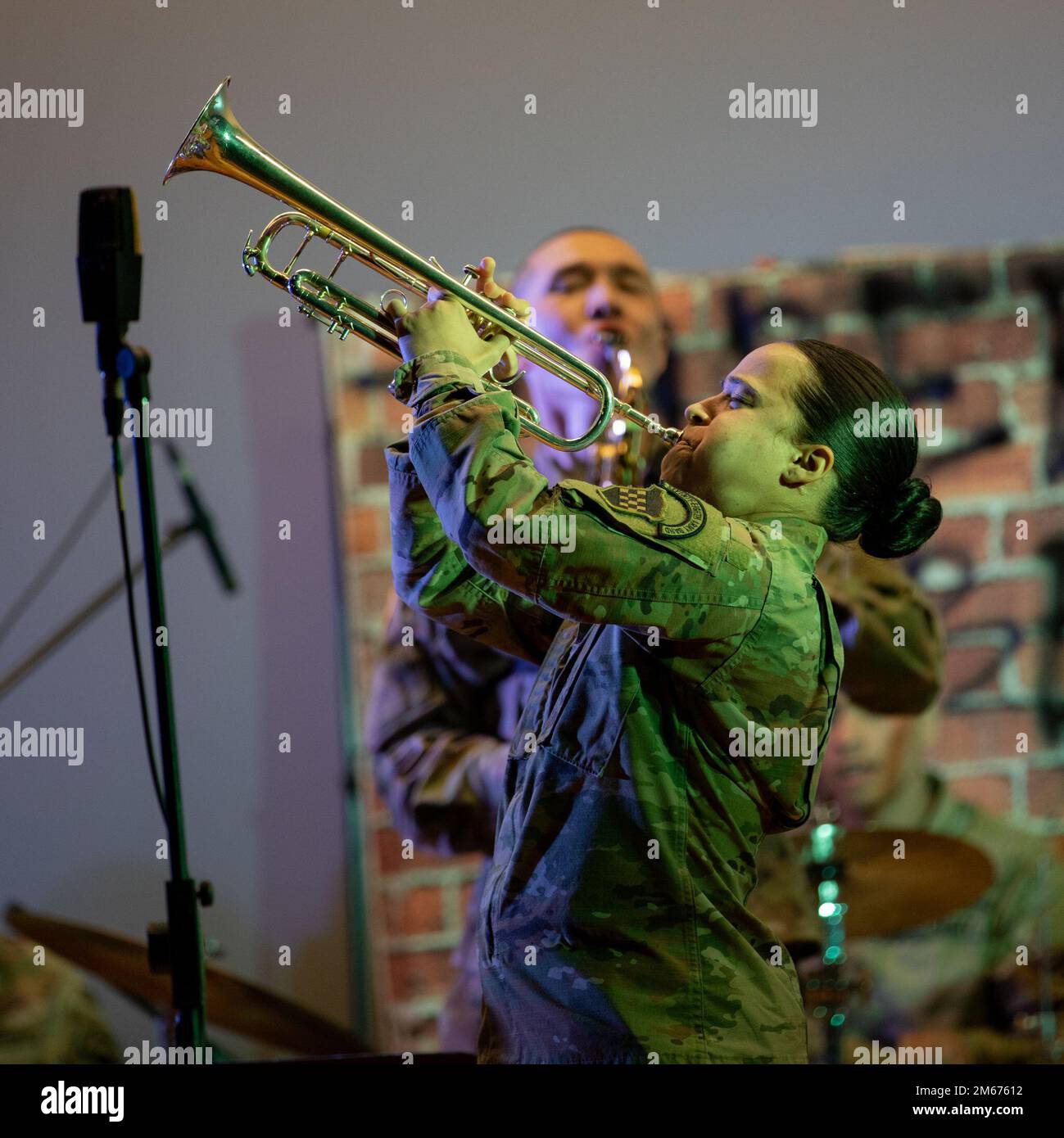 U.S. Army Reserve Spc. Isabel Jamie, a 78th Army Band trumpet player ...