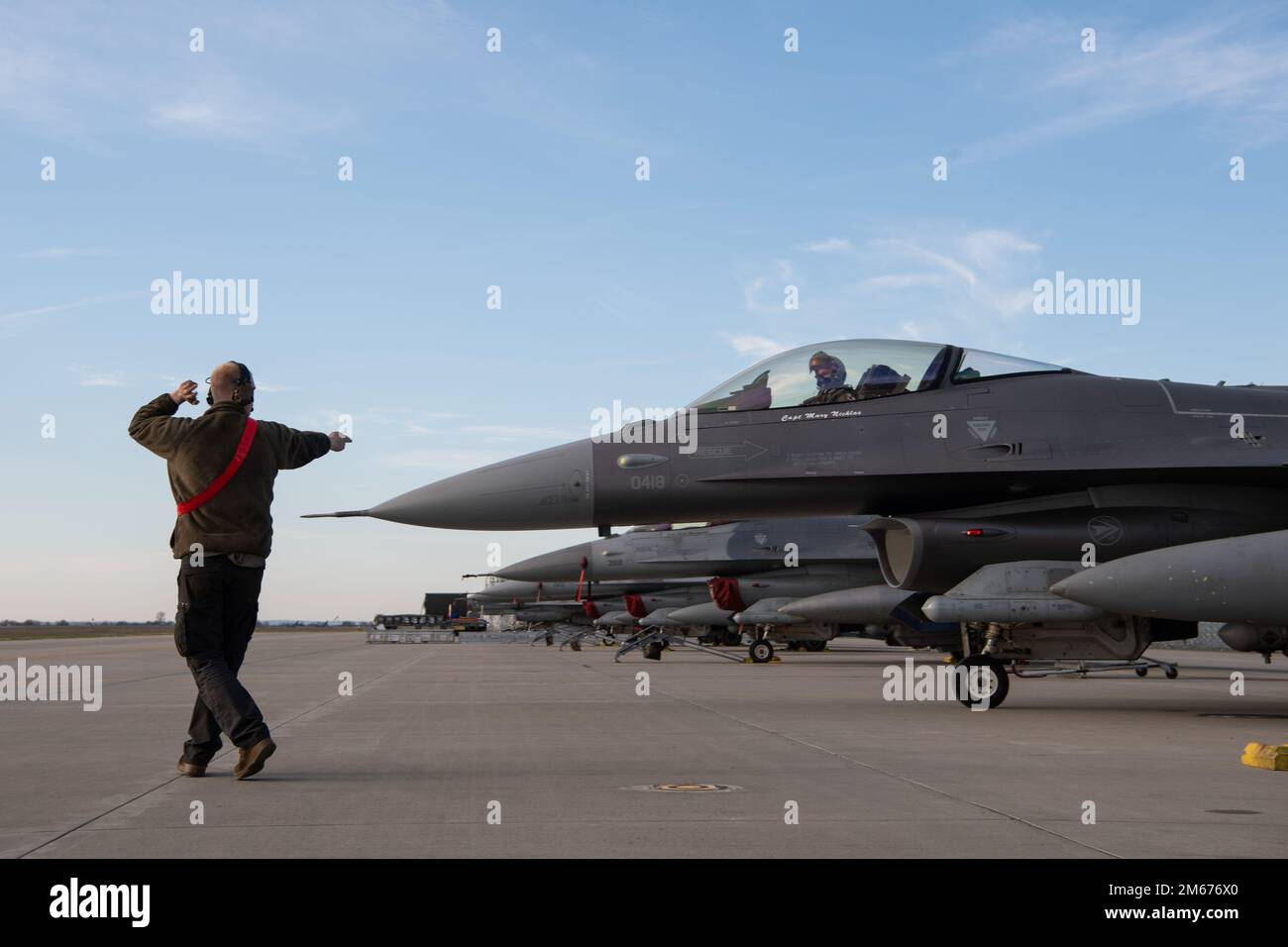 A U.S. Air Force F-16 Fighting Falcon crew chief from the 480th ...