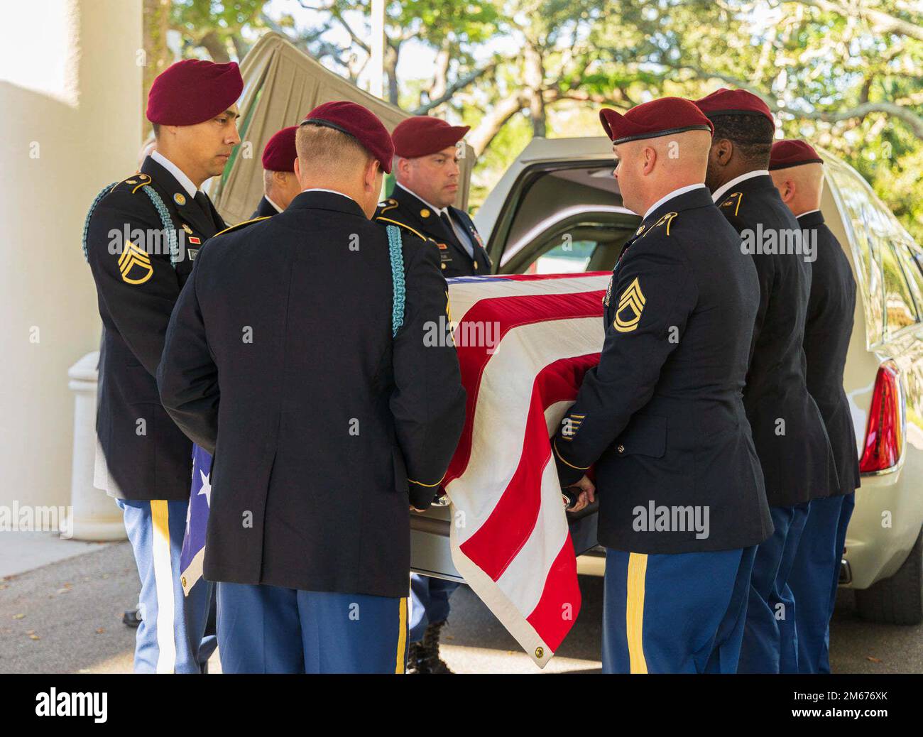 U.S. Soldiers carry Pvt. Andrew J. Ladner's casket during a memorial ...