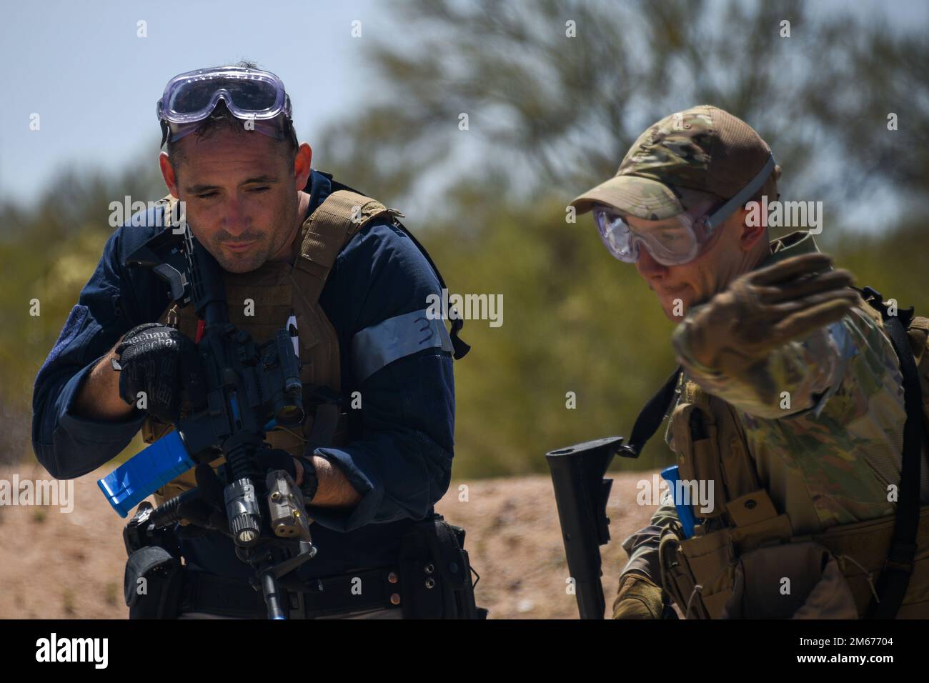 Members of the 355th Security Forces Squadron, practice proper close ...
