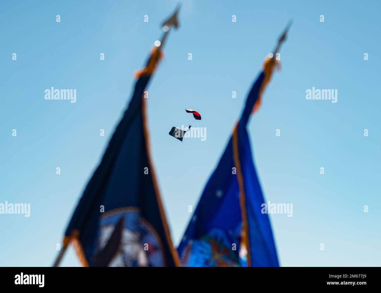 A U.S. Army Black Dagger member displays the Prisoner of War flag ...