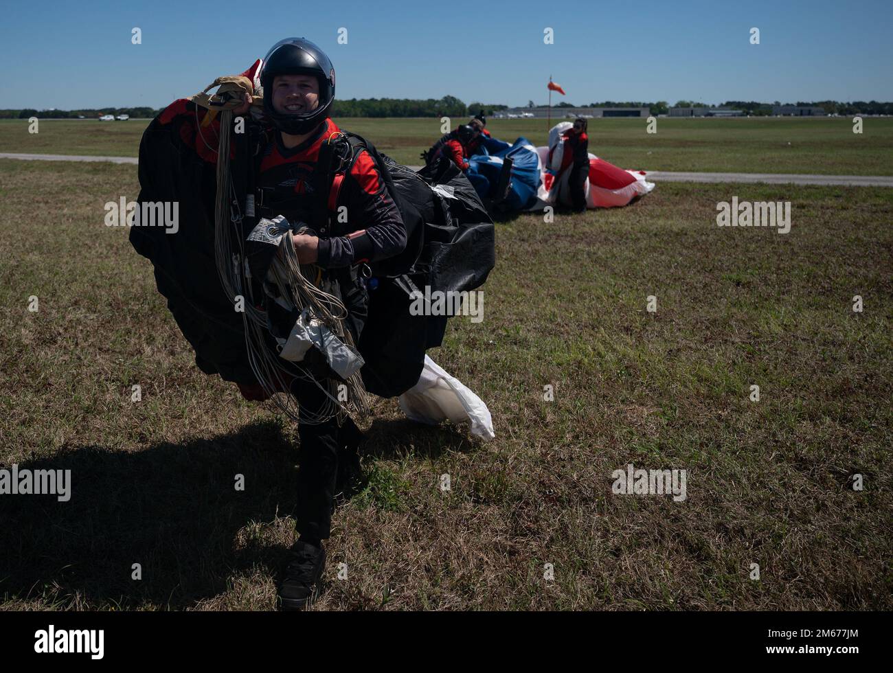 A U.S. Army Black Dagger member finishes a jump at the Titans of Flight ...