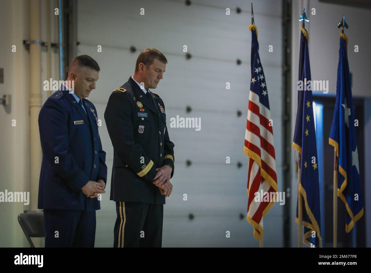 Alaska Army National Guard Brig. Gen.Charles Lee Knowles, bows his head ...