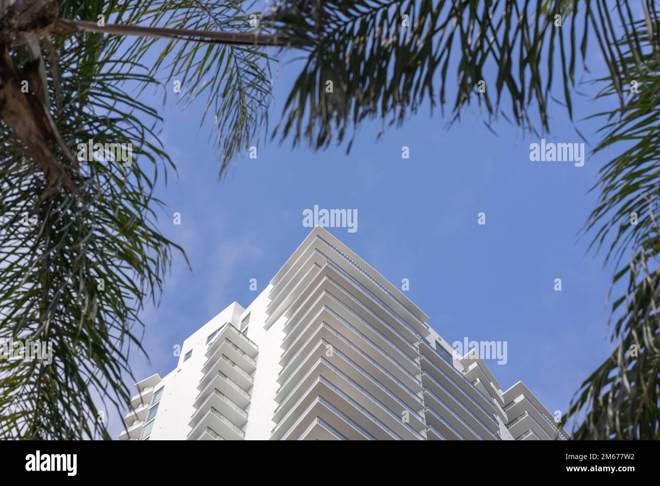 A white modern apartment building Stock Photo - Alamy