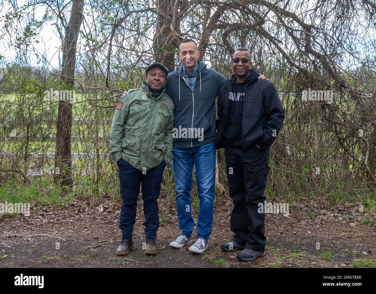 From left, Mr. Darryl R. Griffin, community plans and liaison officer ...