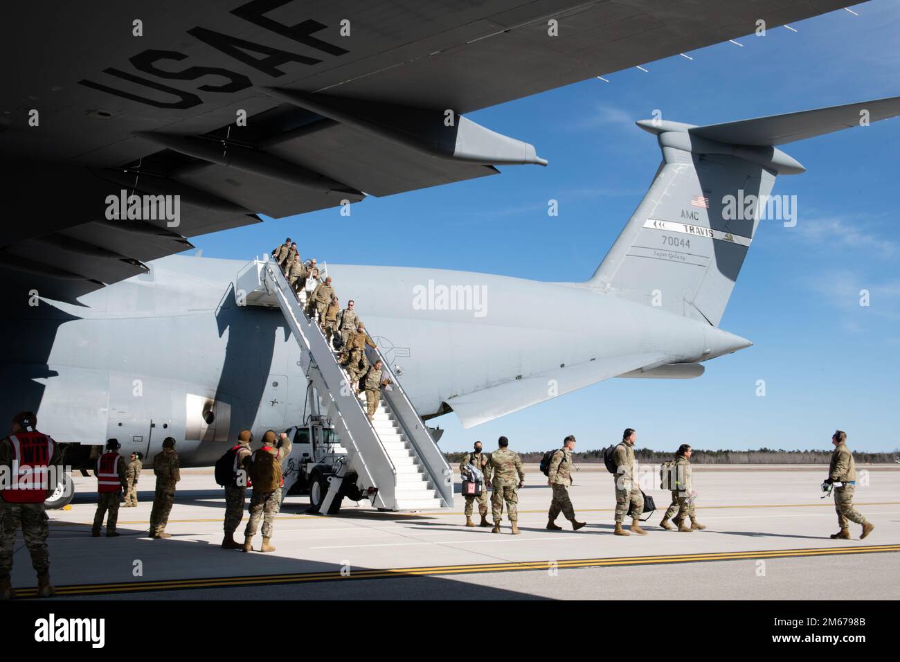 U.S. Airmen from the 60th Air Mobility Wing at Travis Air Force Base ...