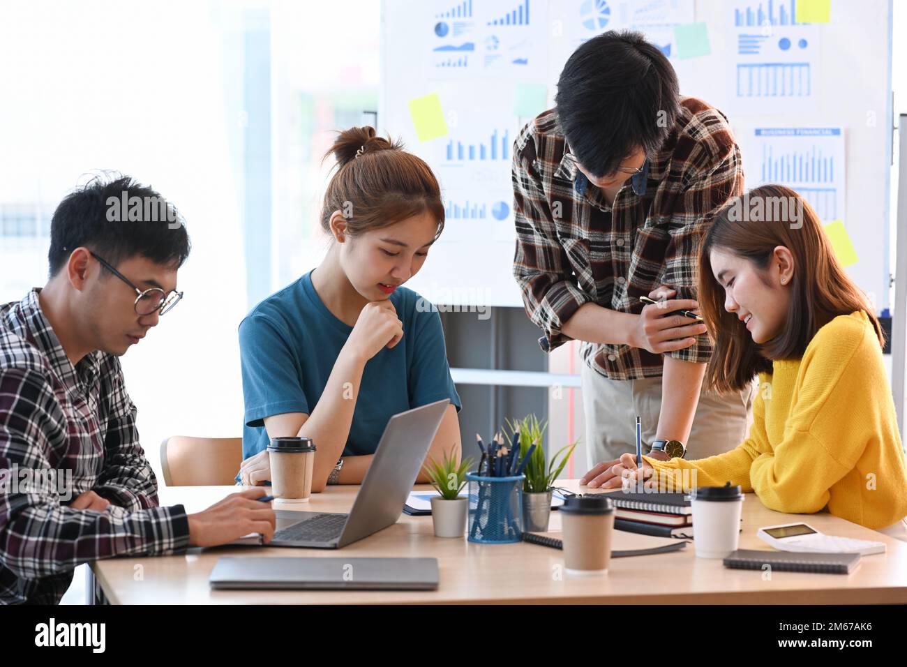 Start up business team brainstorming for important project in modern ...