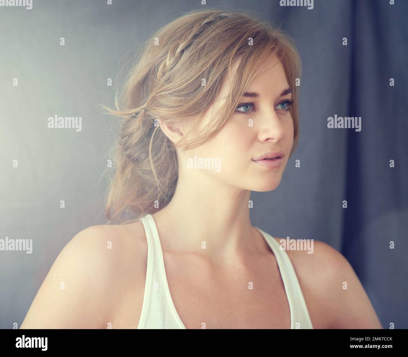 Beautiful woman looking hairstyle hi-res stock photography and images ...