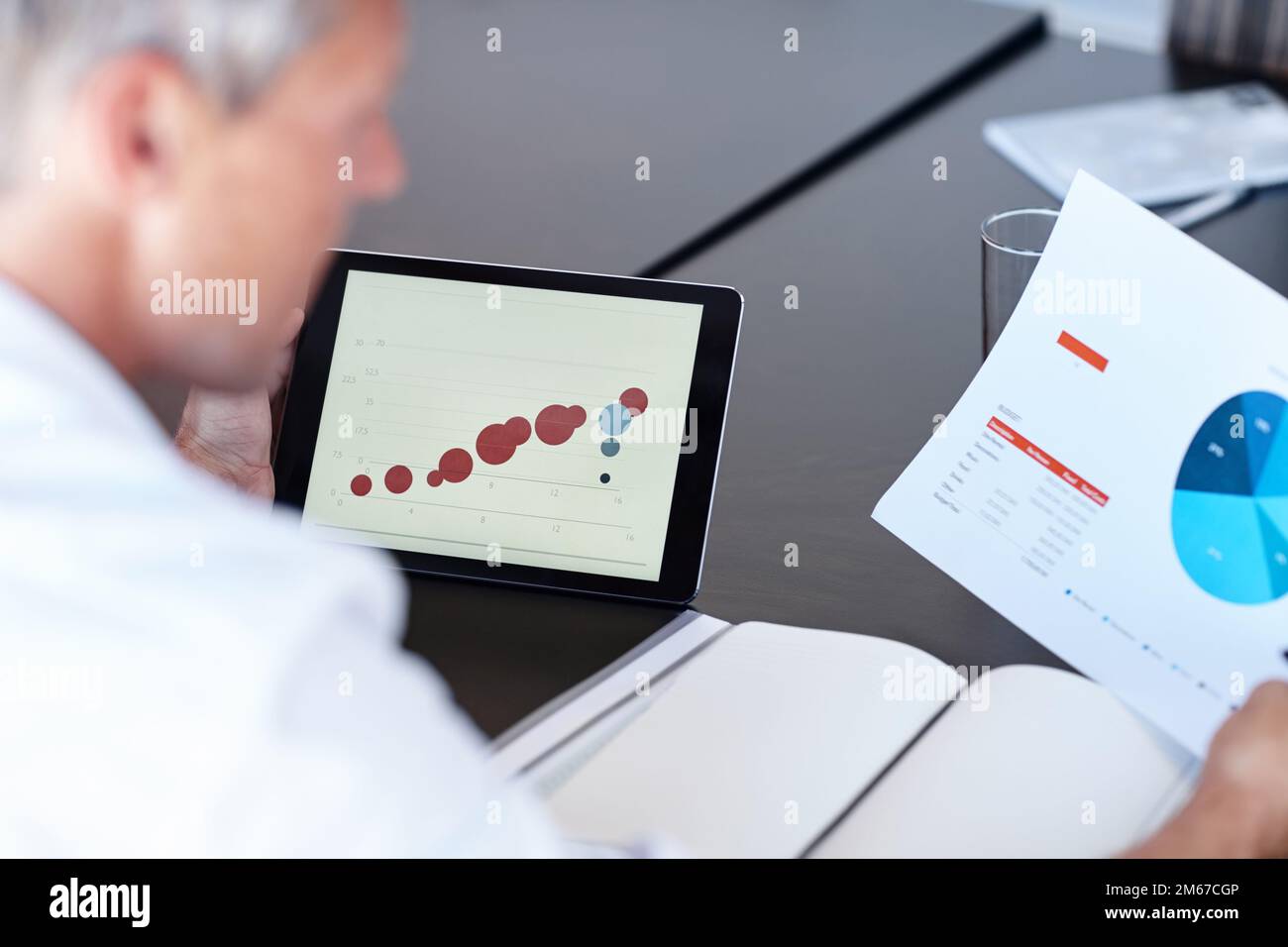 Behind every good business is a great accountant. a businessman looking ...