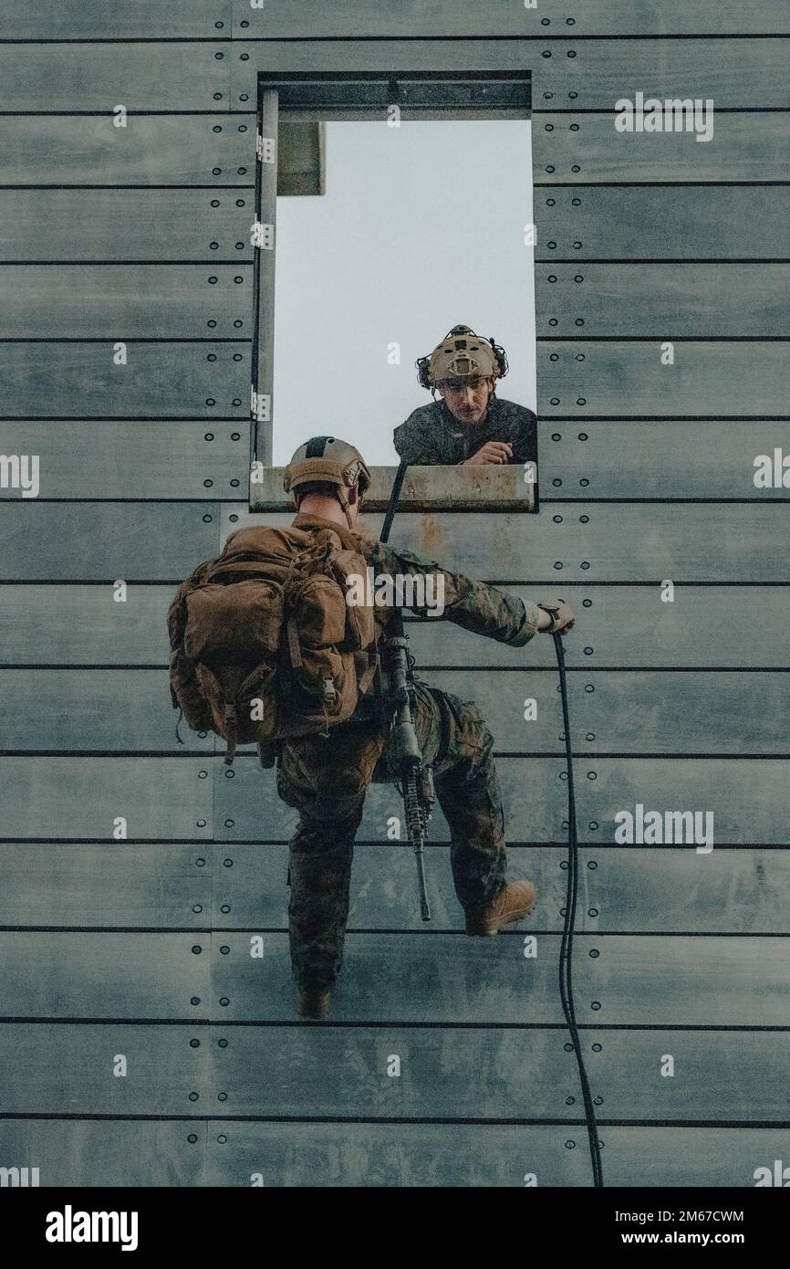 A U.S. Reconaissance Marine with Maritime Raid Force (MRF), 31st Marine ...