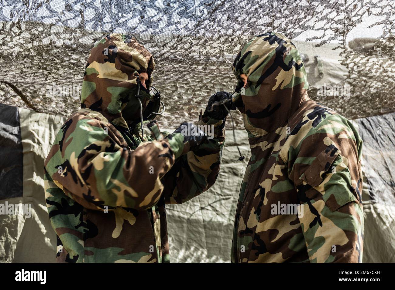U.S. Marine Corps Cpl. Brandon Simmons, left, an ammunition technician ...