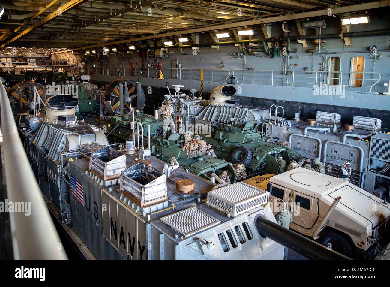 220411-N-PC065-2047 ATLANTIC OCEAN – A U.S. Marine, center, attached to ...