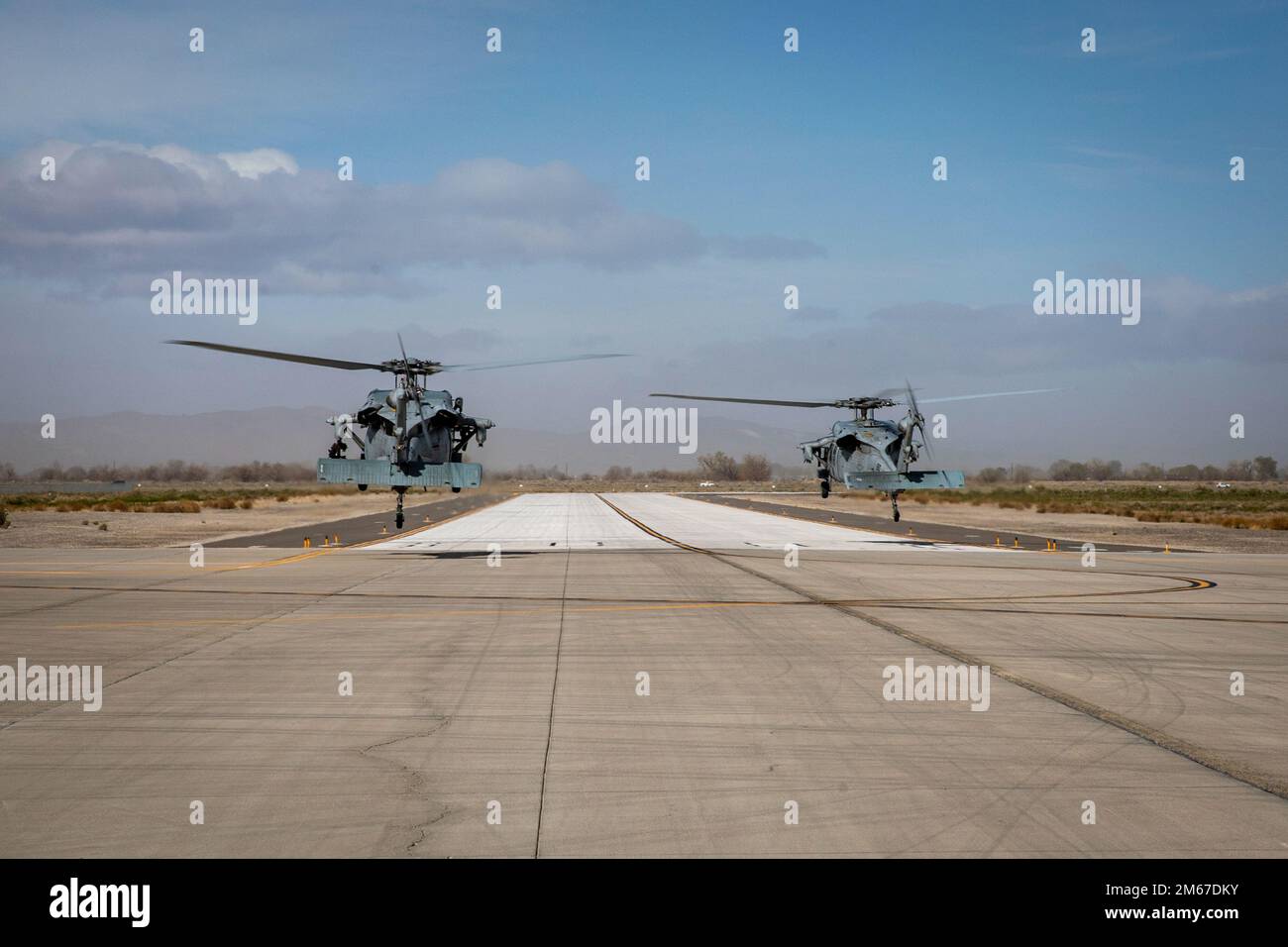 Two MH-60S Knighthawk helicopters attached to Helicopter Sea Combat ...