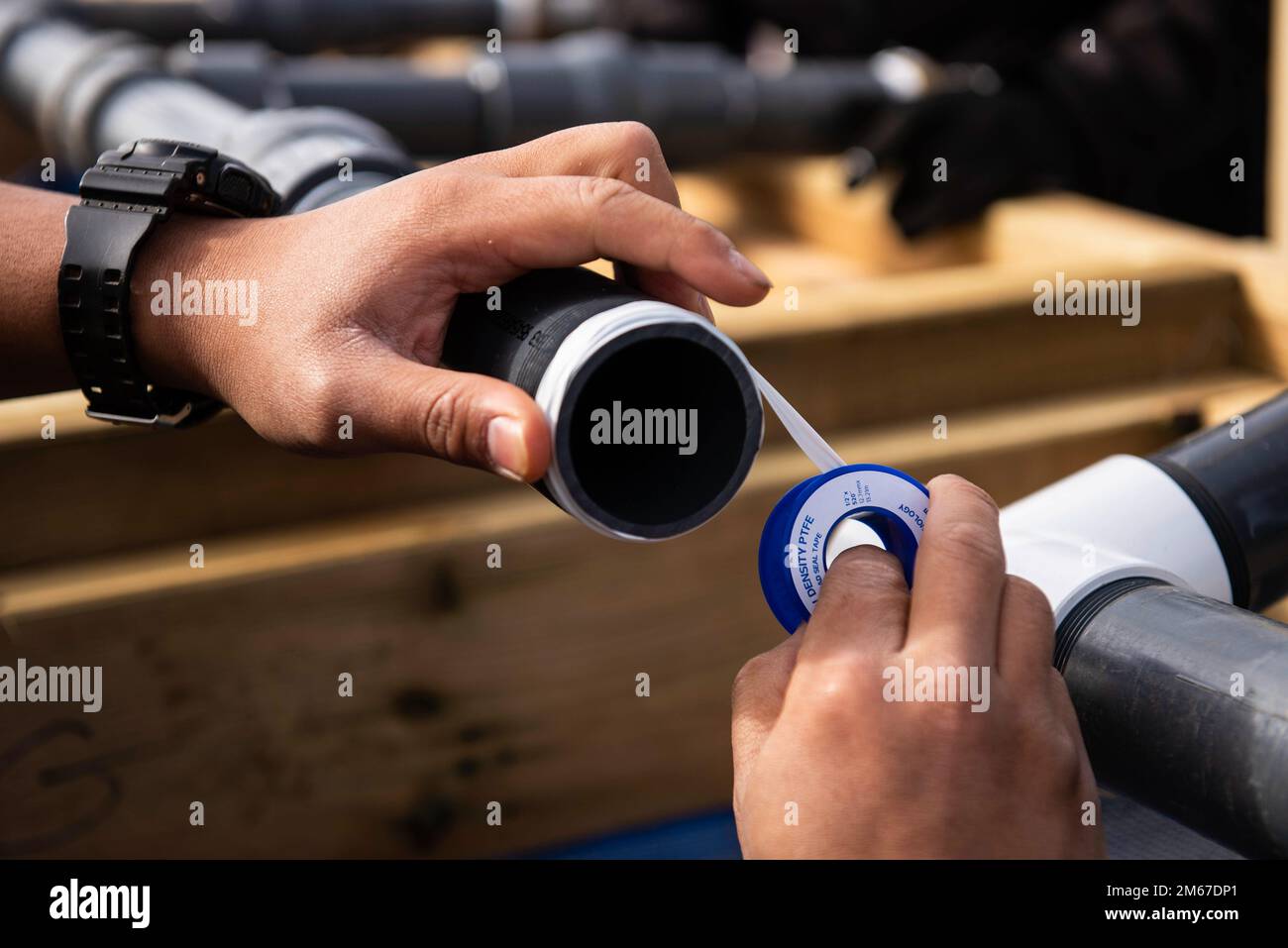 A member of a Defense POW/MIA Accounting Agency (DPAA) recovery team ...