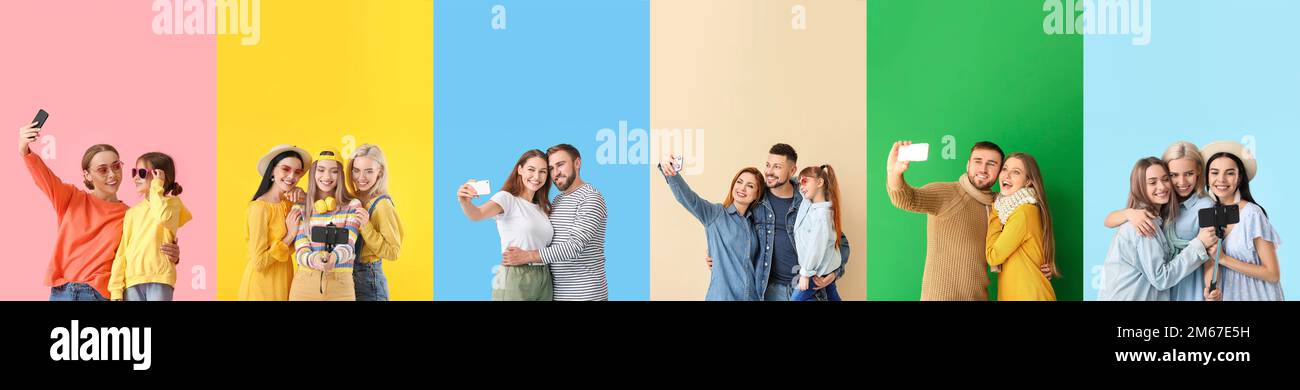 Group of happy people with mobile phones taking selfie on color ...
