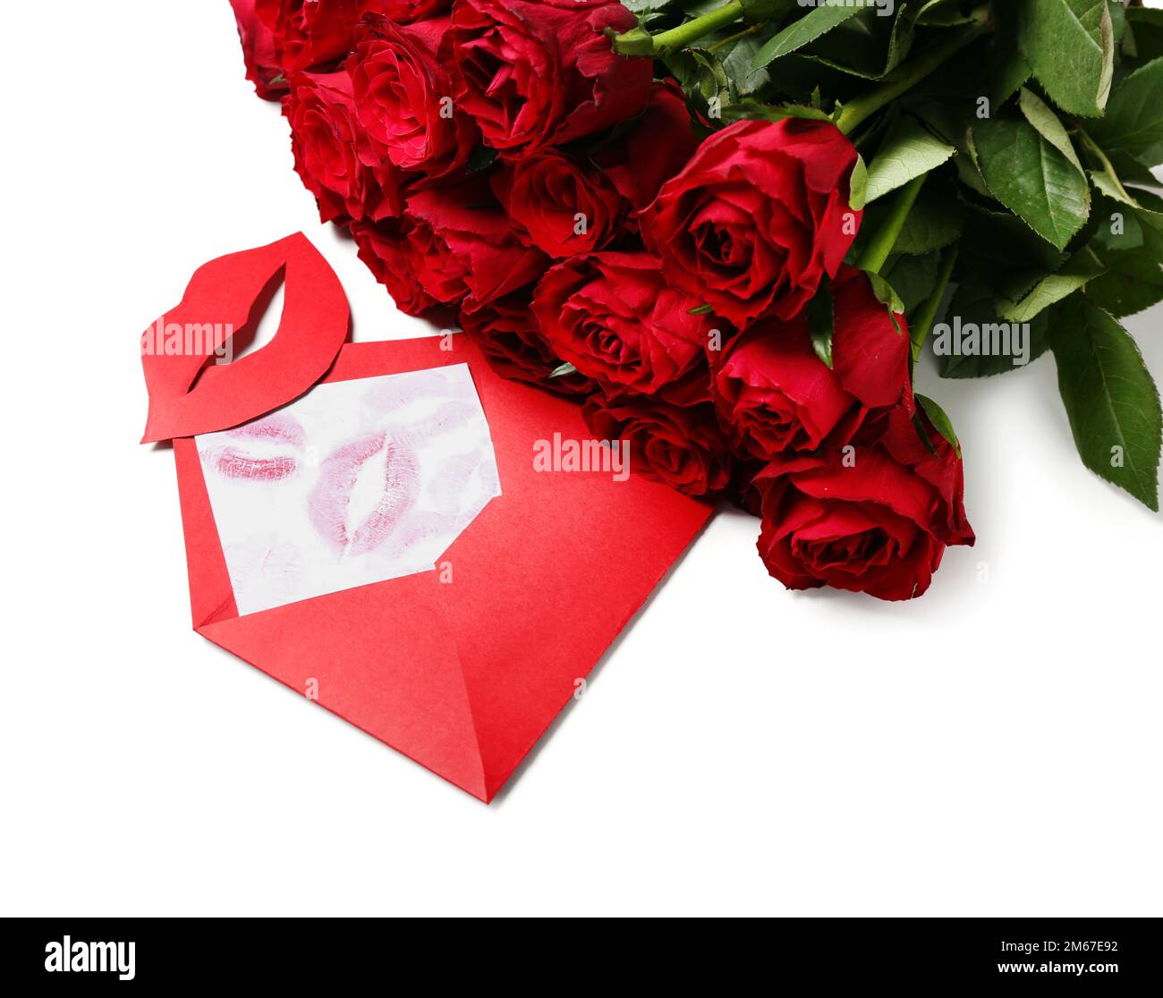 Red roses, envelope with lipstick kisses and paper lips on white ...