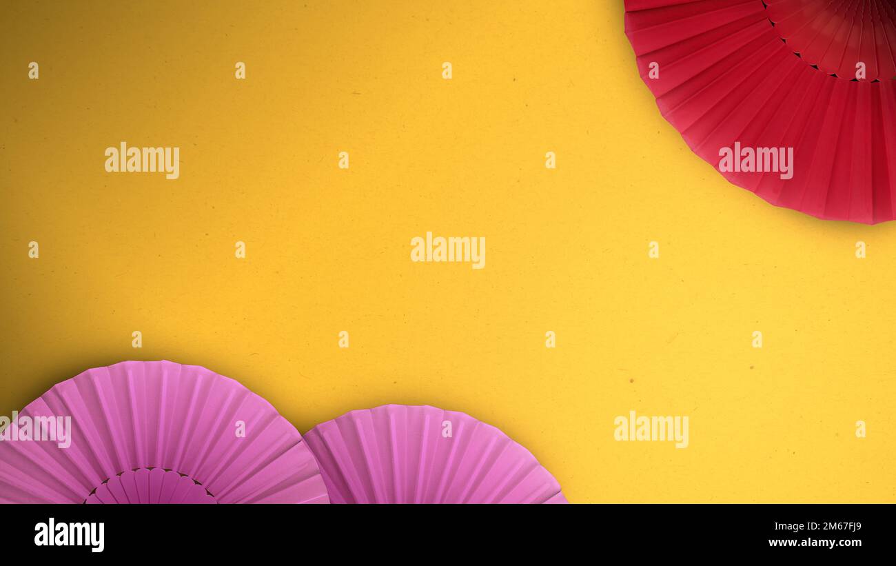 Colorful Chinese fan on a colored background Stock Photo - Alamy