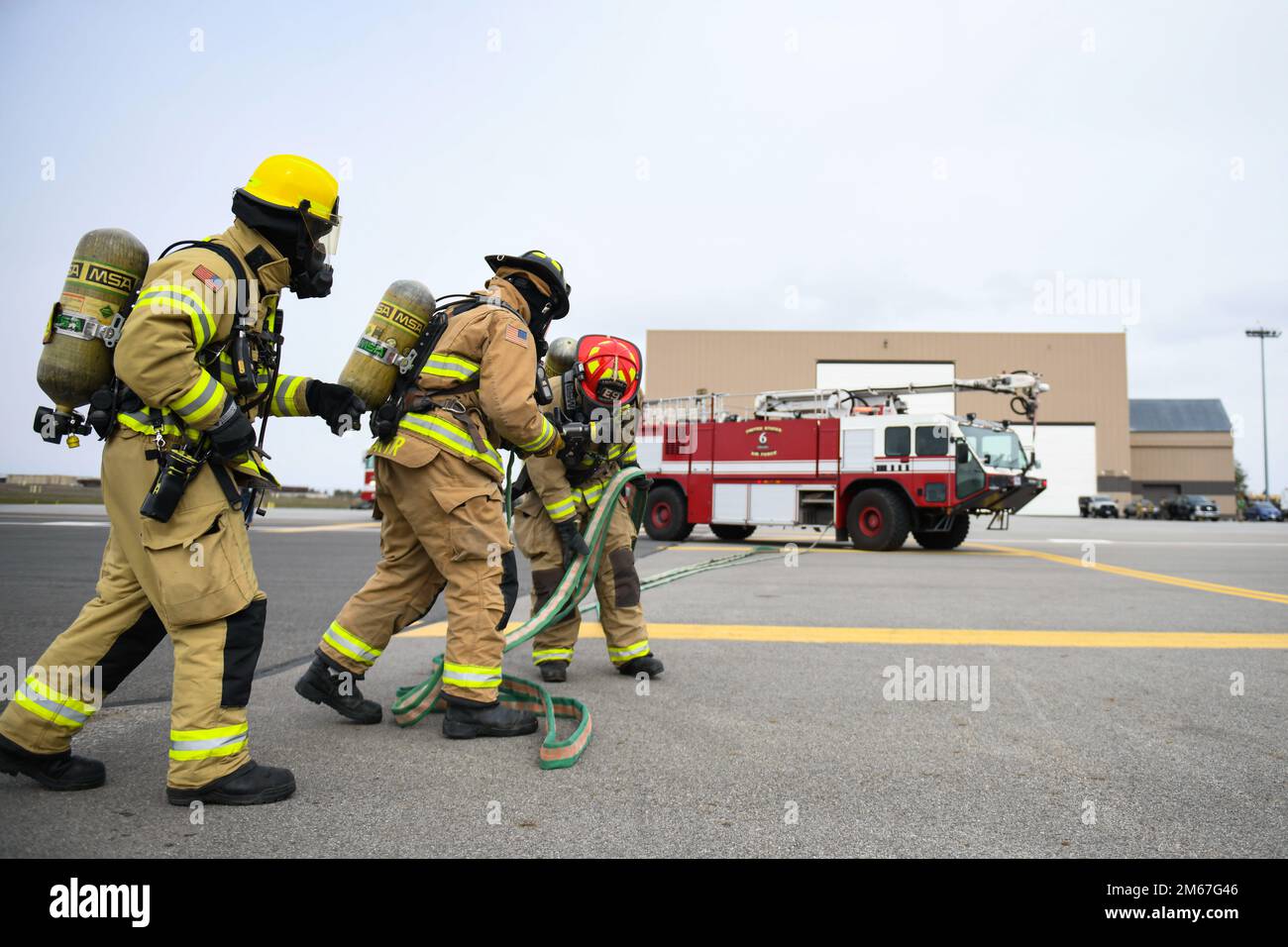 U.S. Air Force Airmen from the 92nd Civil Engineer Squadron fire ...
